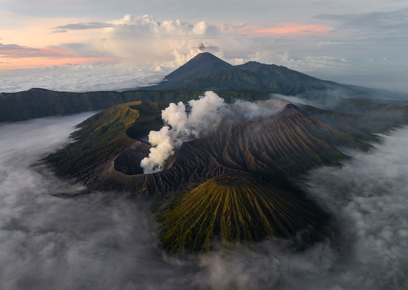 Bromo Hattrick - Water vapor rising from Bromo volcano's crater, rising ...