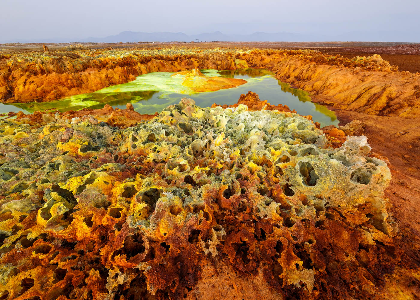 Petrified Rainbow - Miniature geysers at the sulfuric acid pool area of ...