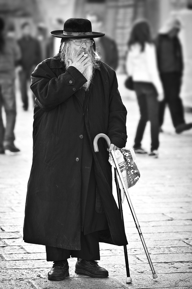 A Moment's Peace - An ultra-orthodox Jew grabs a moment for a quick ...