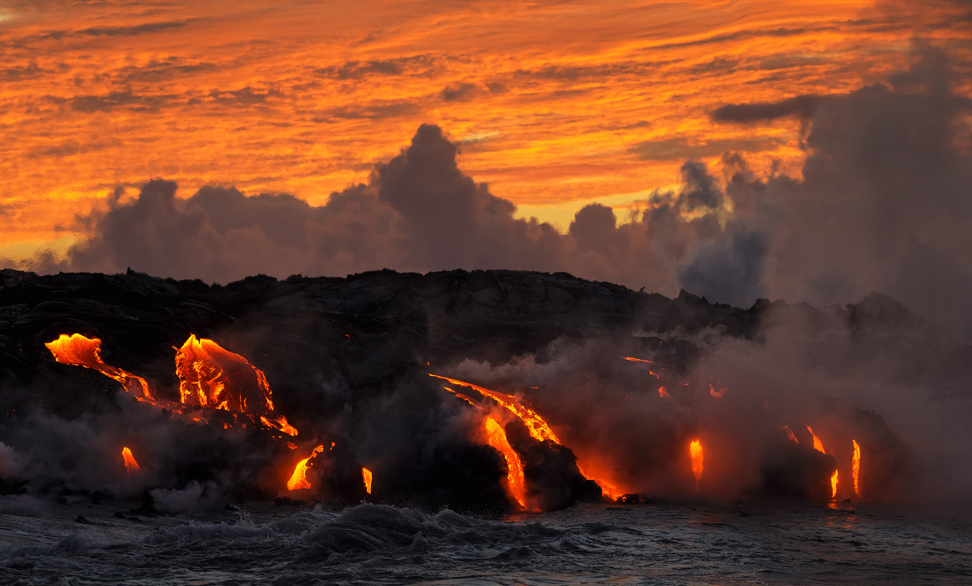 Volcanic Sunrise - Wonderful sunrise colors shine behind flowing red ...