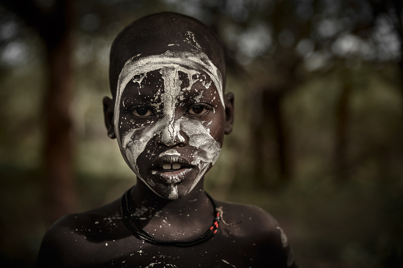 Spray Paint - young Hamar boy with traditional face painting - Lower ...