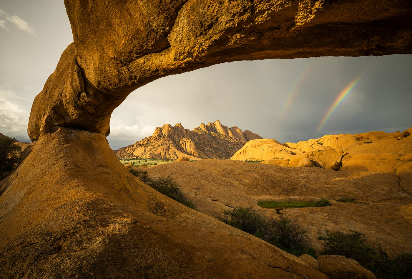 Three Arches - The rock arch of Spitzkoppe, complemented by two additional arches in the form of ...