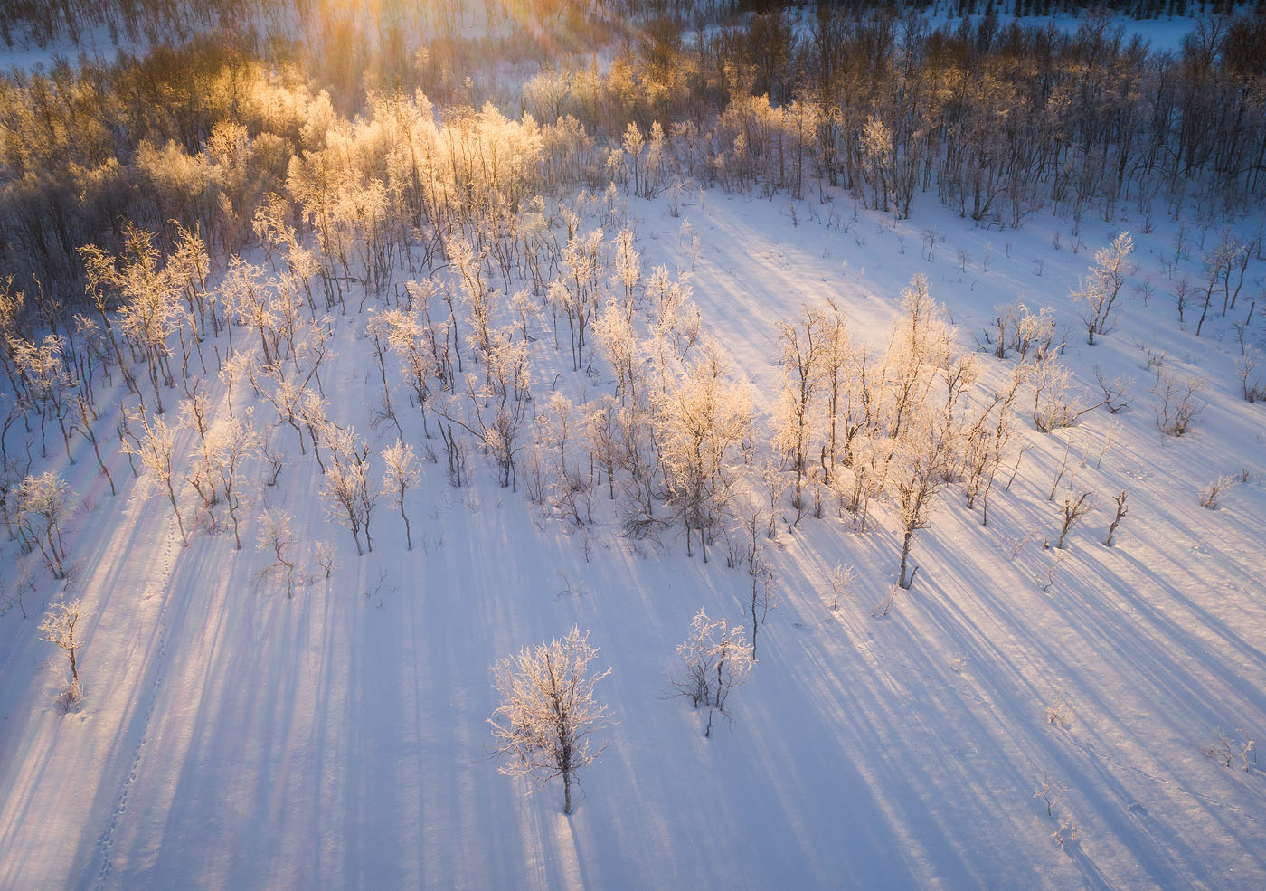 Arctic Rays - An aerial of a beautifully lit frigid scene in the frozen ...